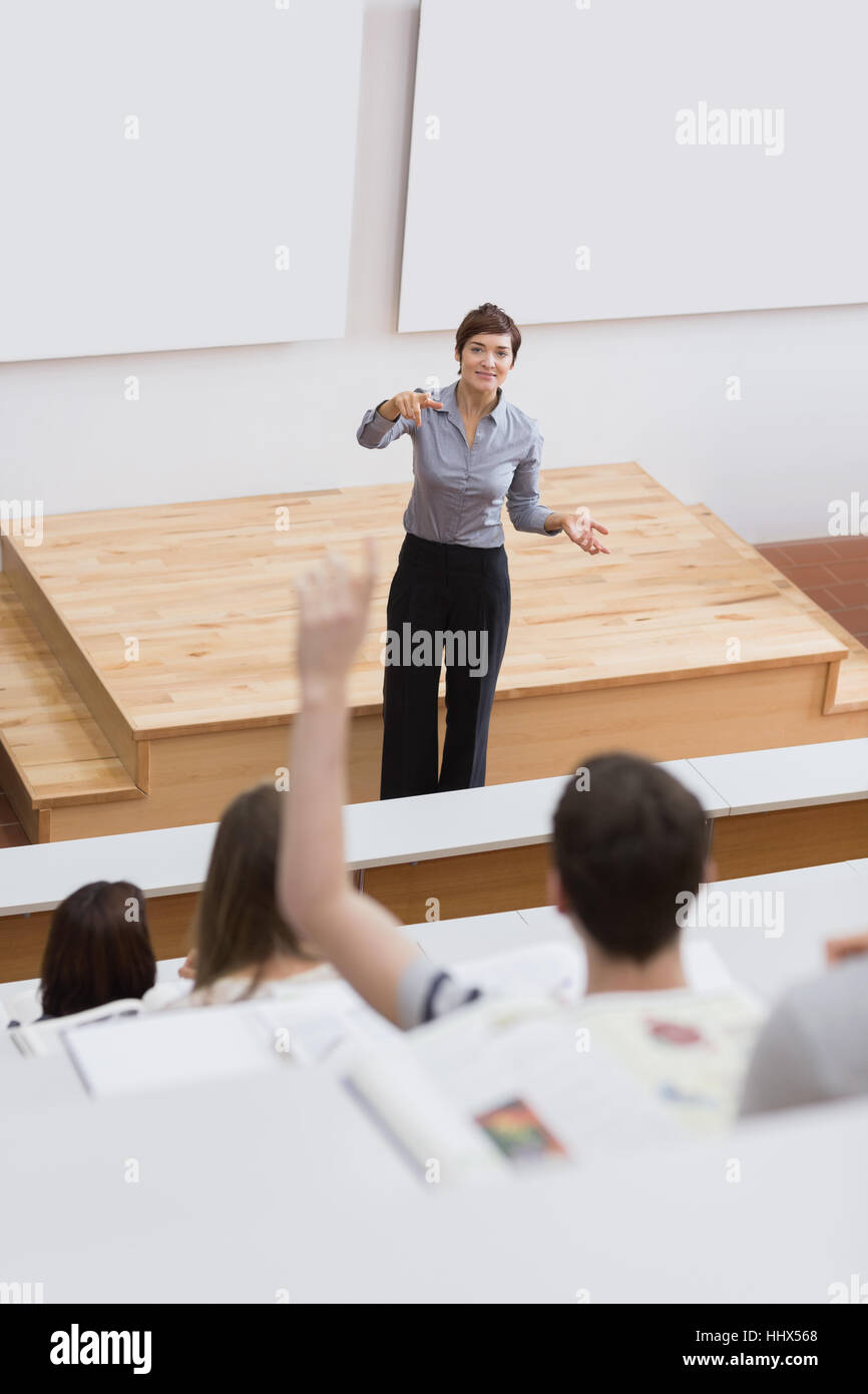 Student is asking question in lecture Stock Photo - Alamy