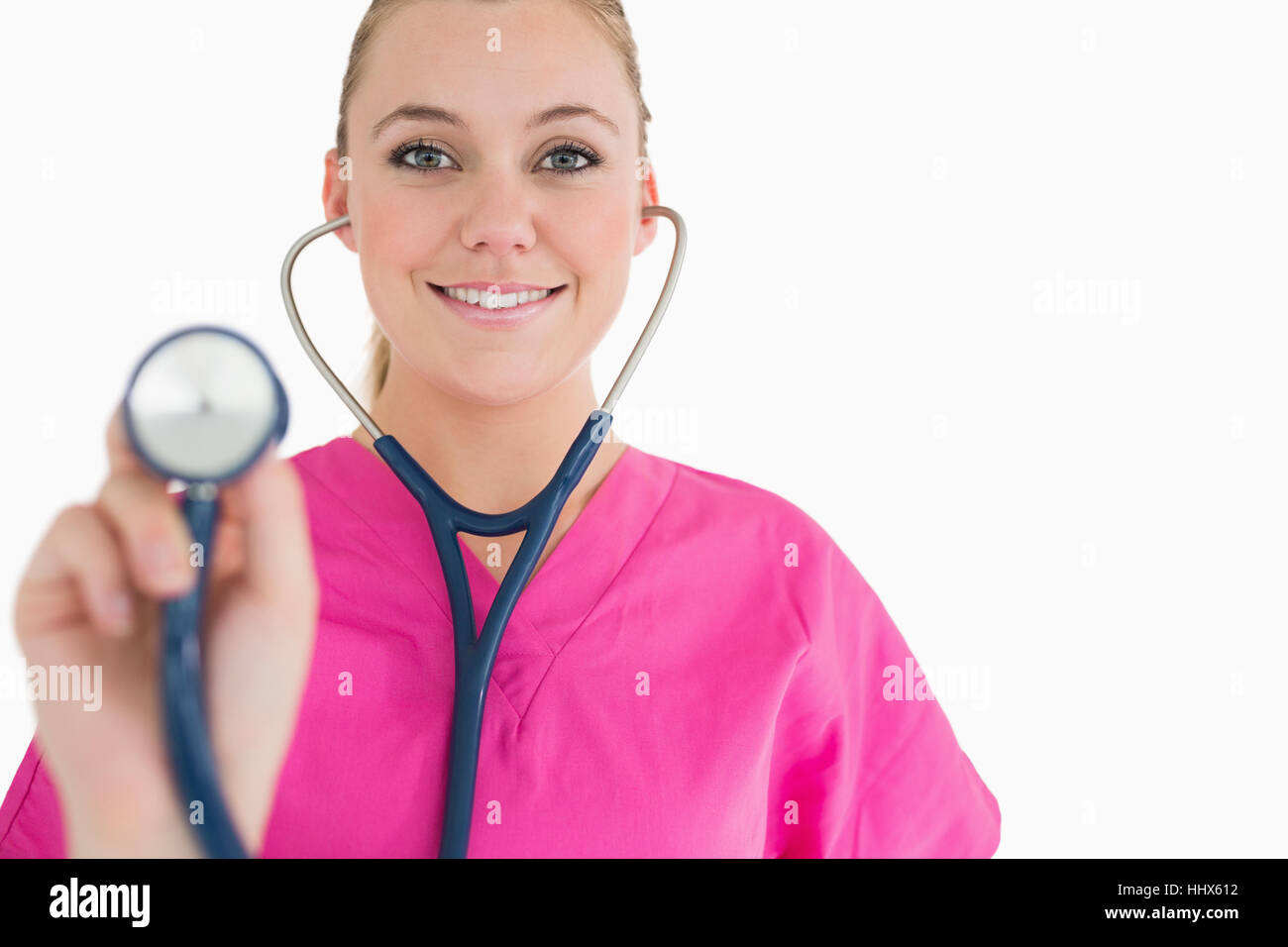 Female doctor using a stethoscope Stock Photo - Alamy