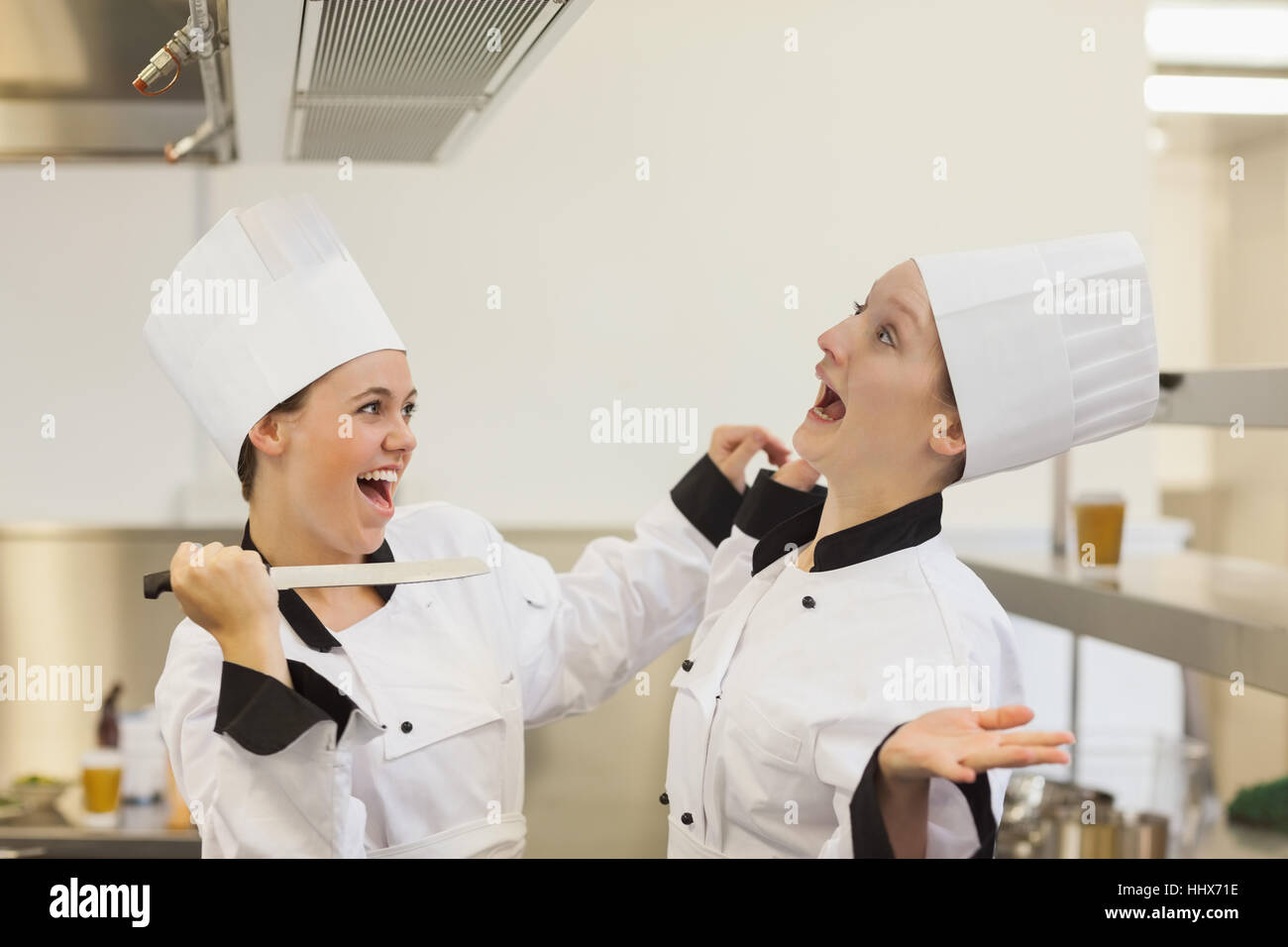 Chefs having fun cooking hi-res stock photography and images - Alamy