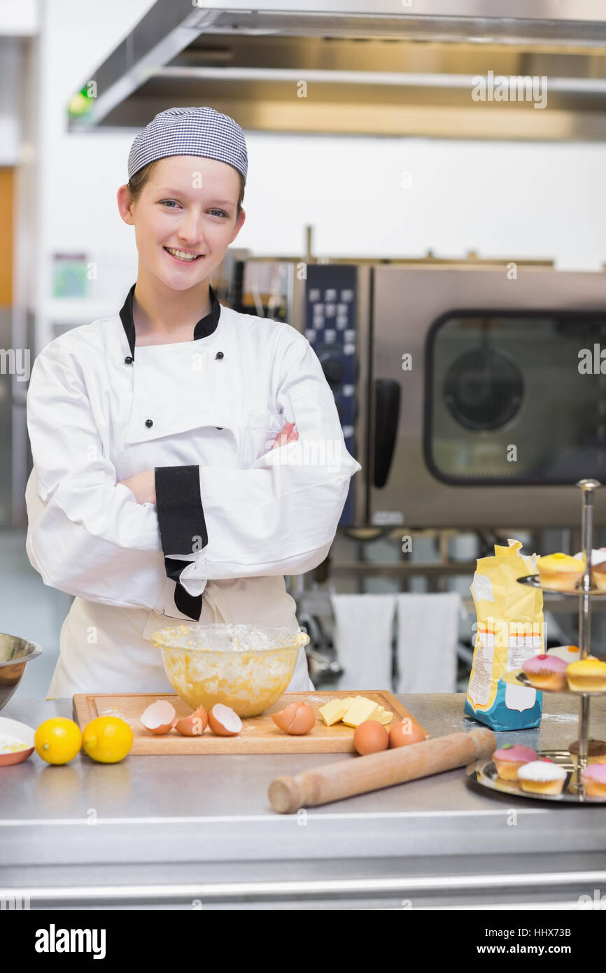Woman smiling behind bakery counter hi-res stock photography and images ...