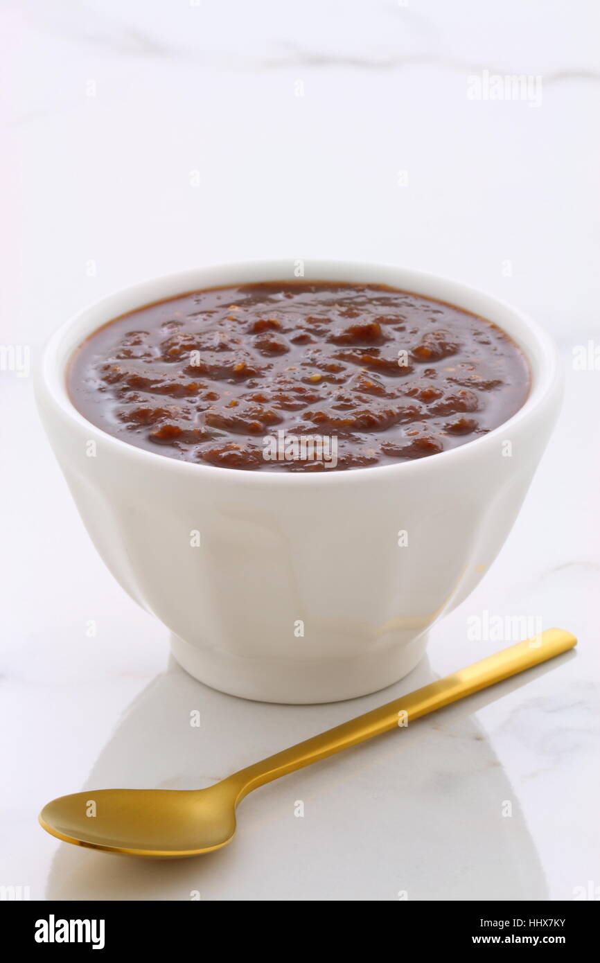 Artisan mexican chipotle sauce on vintage carrara marble table, with a ...