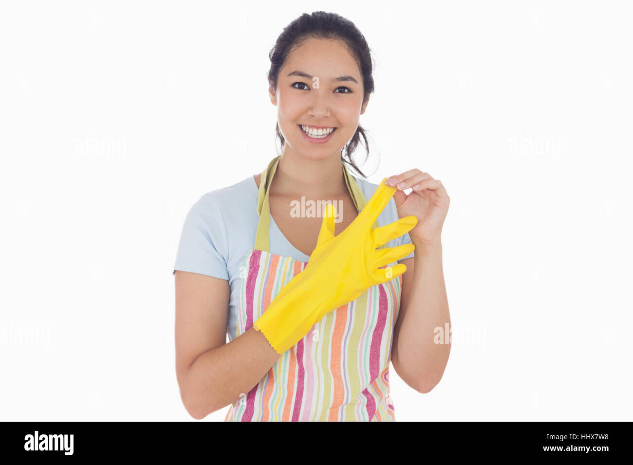 Woman taking off rubber gloves hi-res stock photography and images - Alamy