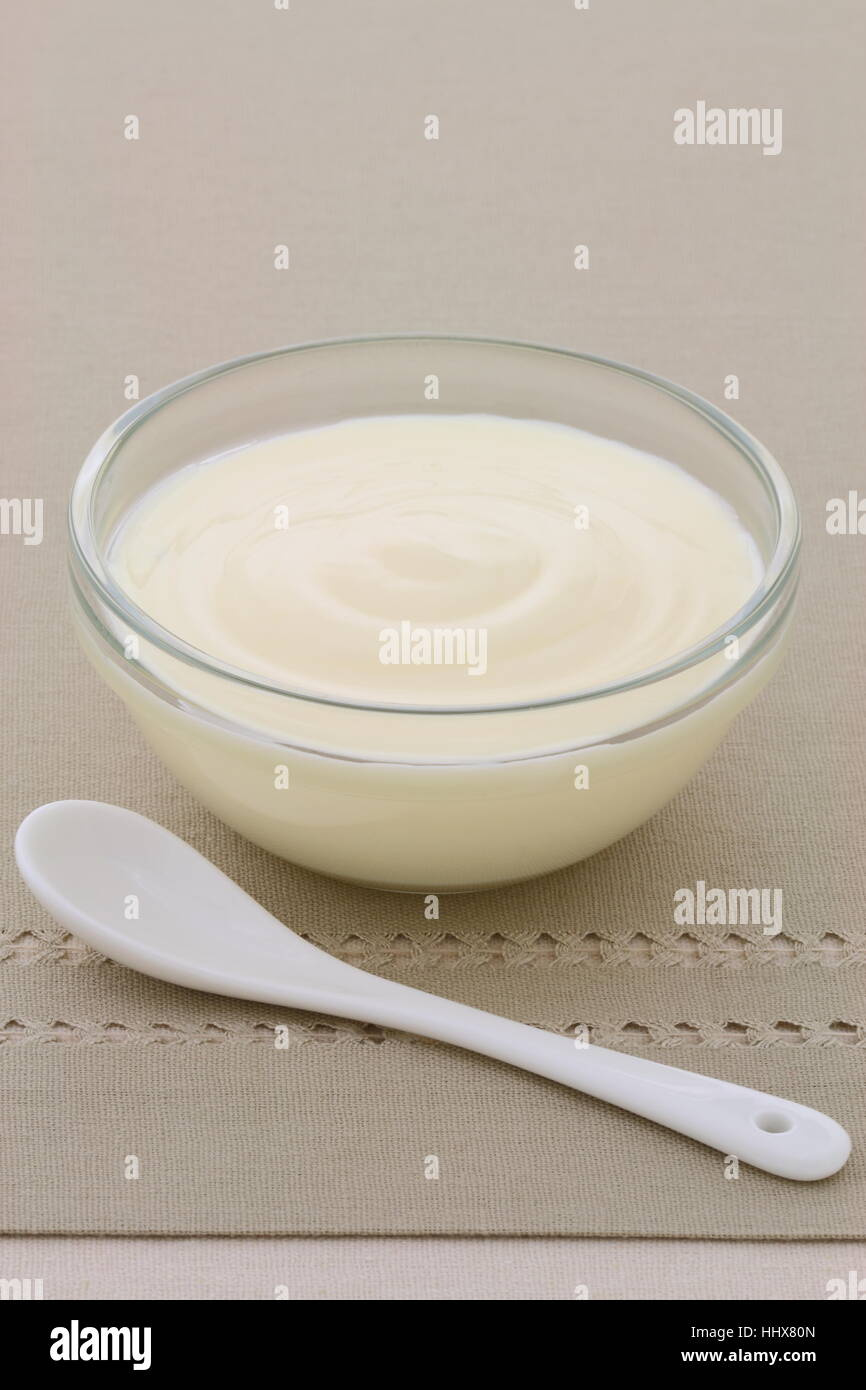 Delicious, nutritious and healthy fresh plain yogurt on vintage carrara ...