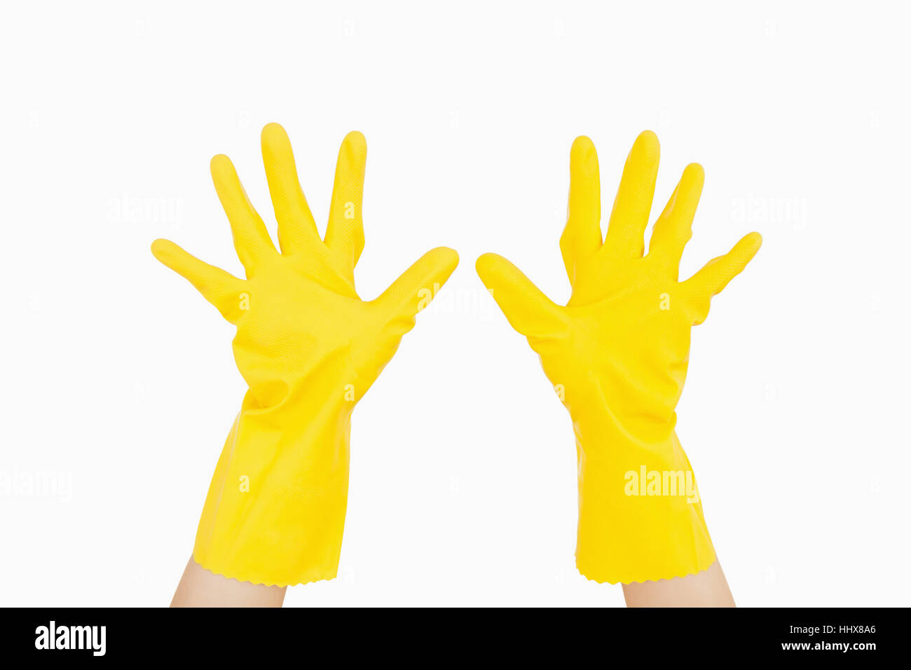 Outstretched hands wearing yellow rubber gloves Stock Photo - Alamy