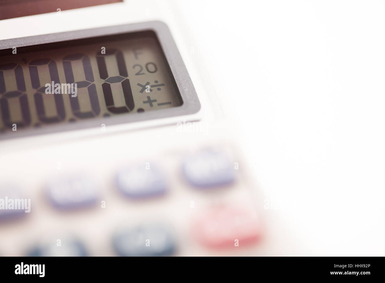 Calculator close up on white background Stock Photo - Alamy