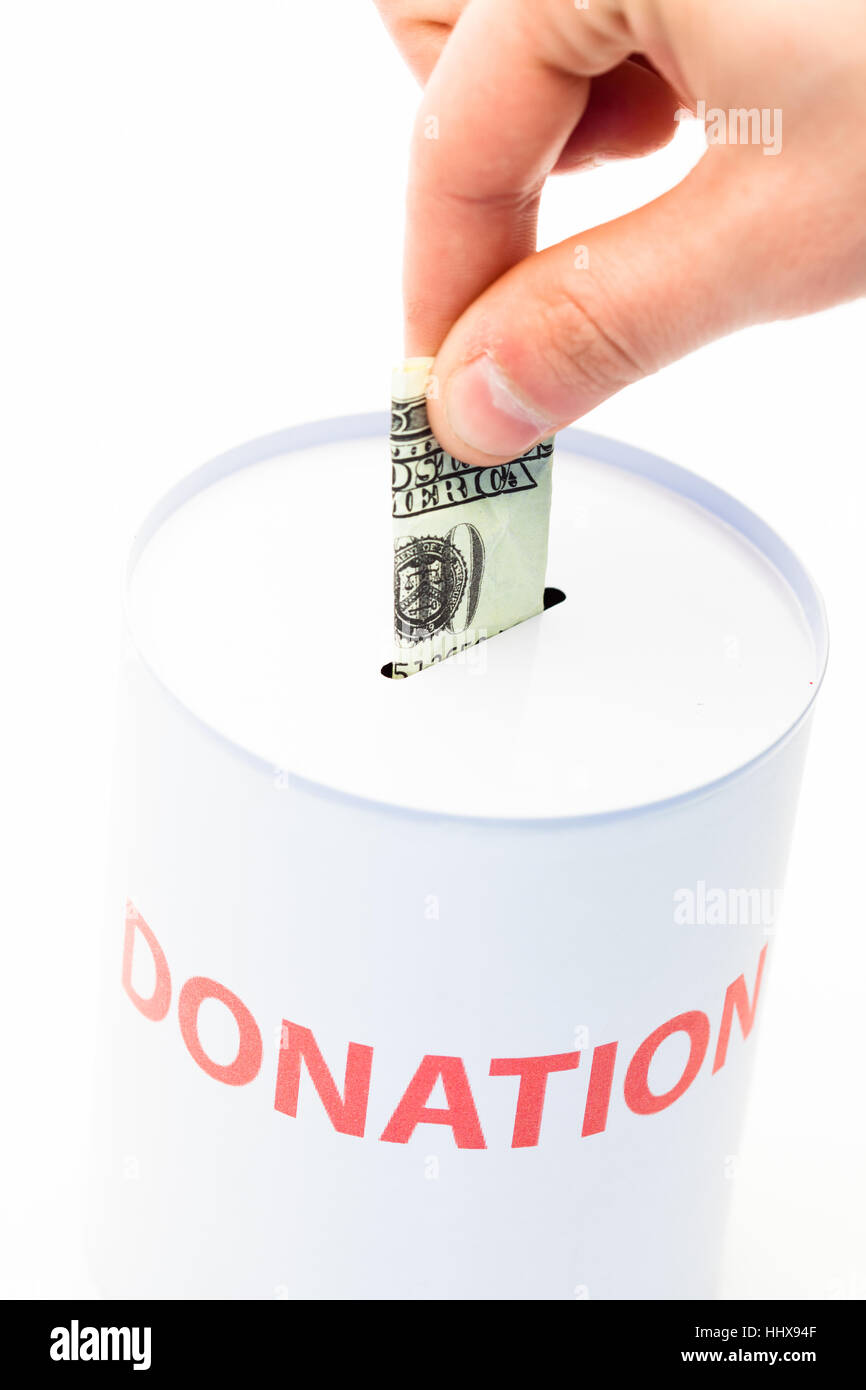 Hand donating money to charity Stock Photo - Alamy