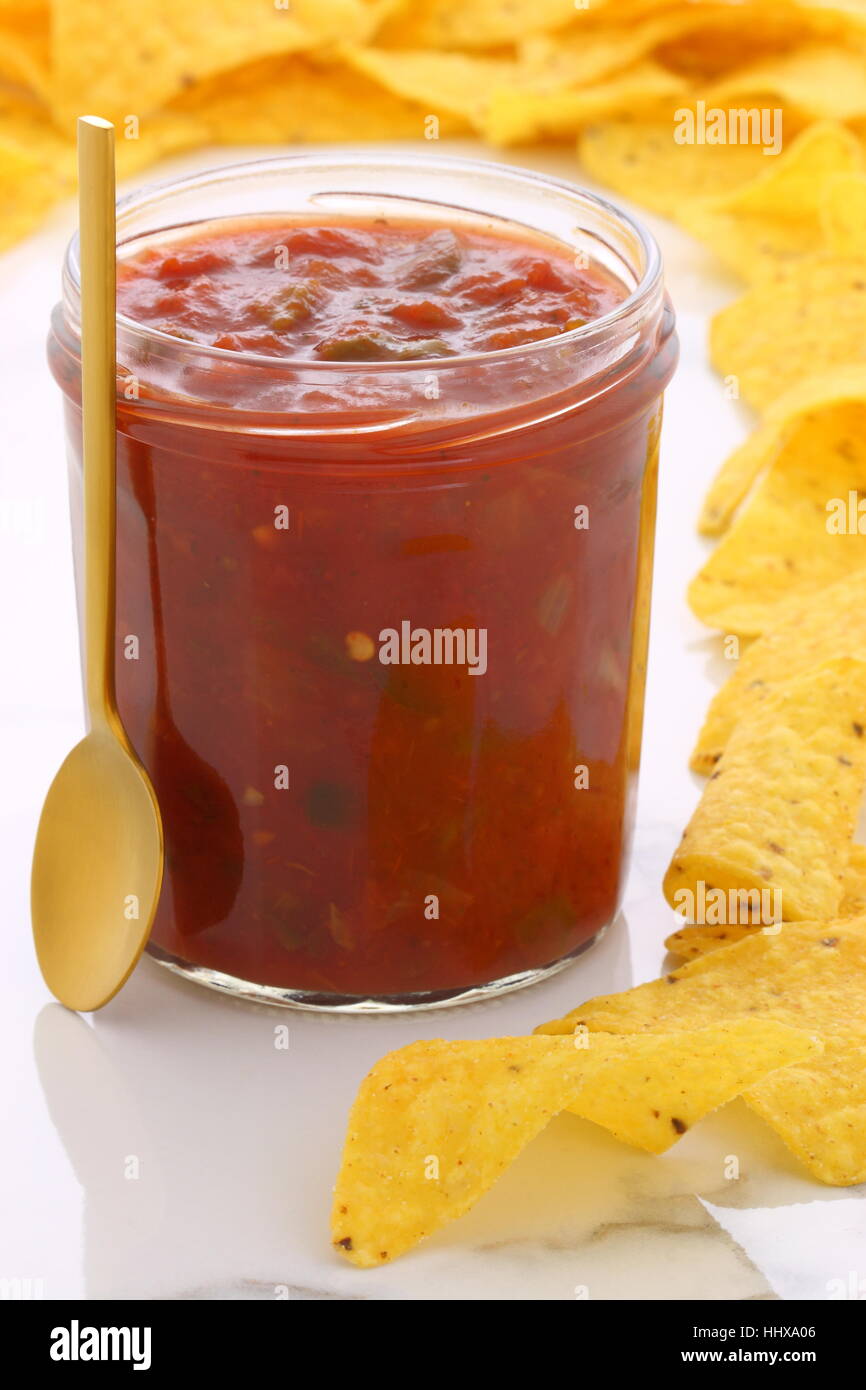 Artisan mexican dip salsa on vintage carrara marble table, with a ...