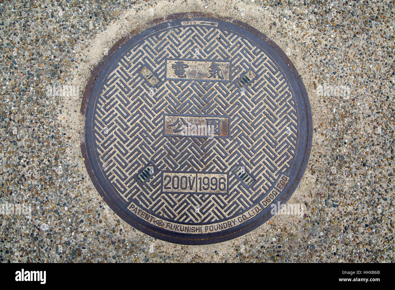 Circle steel manhole cover or metal sewer on the street in Japan Stock ...