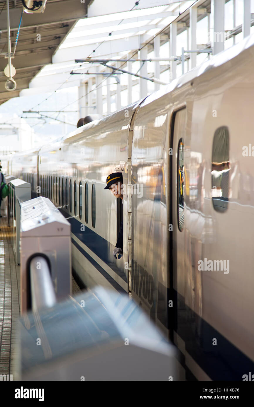 HIROSHIMA, JAPAN - OCTOBER 10, 2016: Unidentified womn at Shinkansen ...