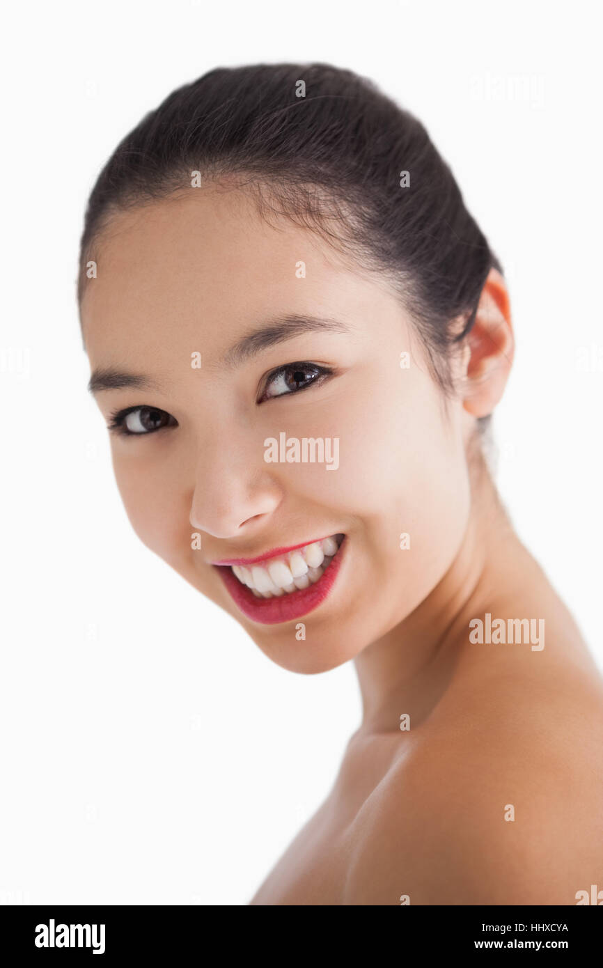 Young woman smiling with red lips on white background Stock Photo - Alamy
