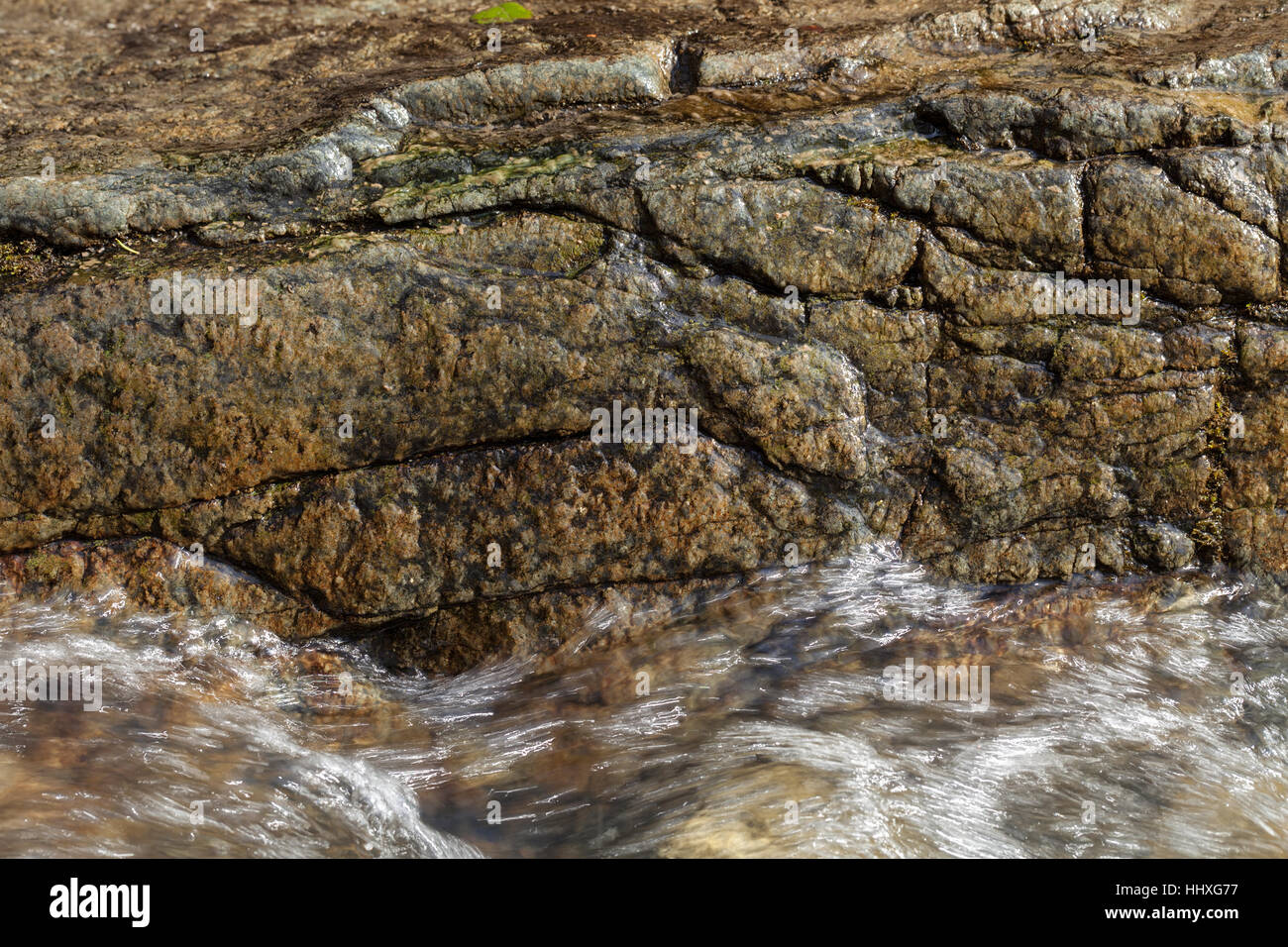 stone under the mountain water, note shallow depth of field Stock Photo ...