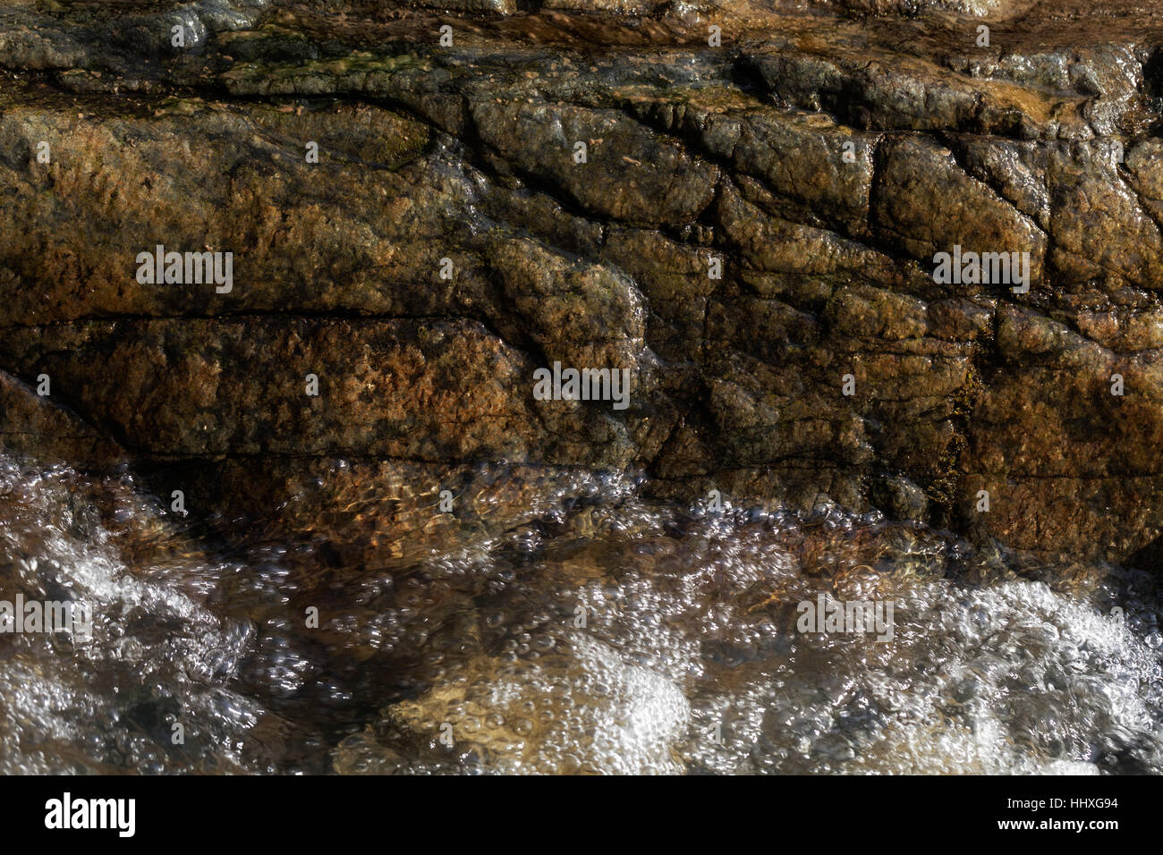stone under the mountain water, note shallow depth of field Stock Photo ...