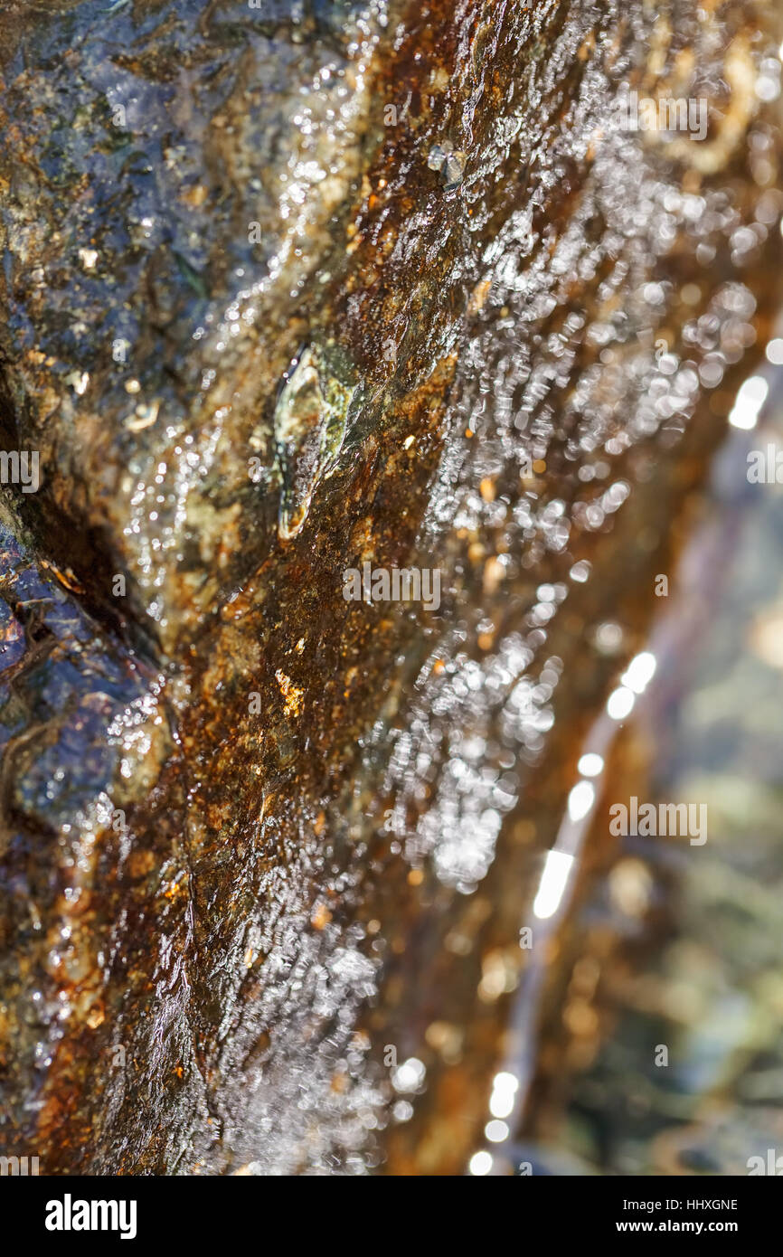 stone under the mountain water, note shallow depth of field Stock Photo ...