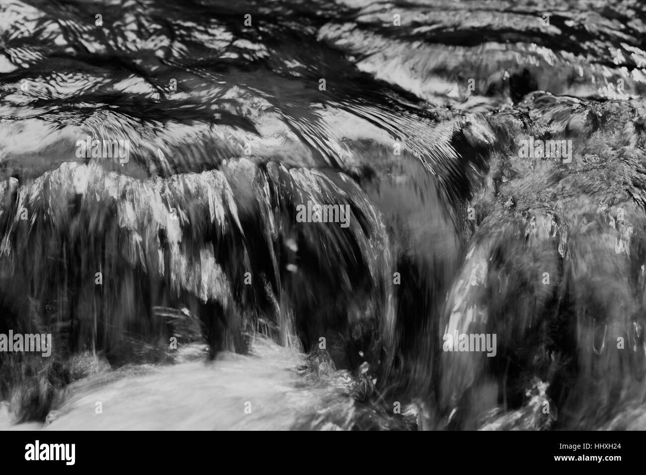 stone under the mountain water, note shallow depth of field Stock Photo ...