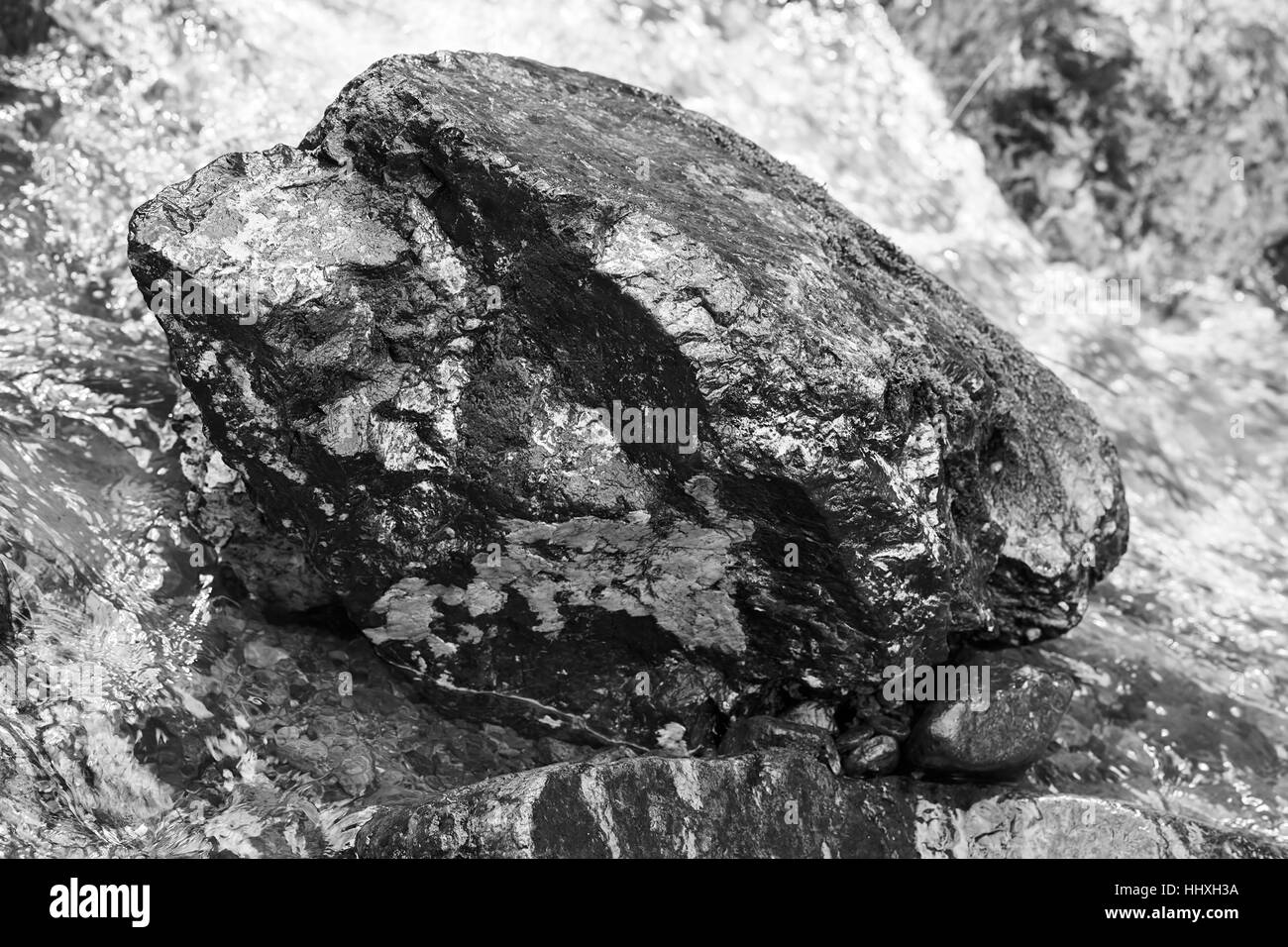 stone under the mountain water, note shallow depth of field Stock Photo ...