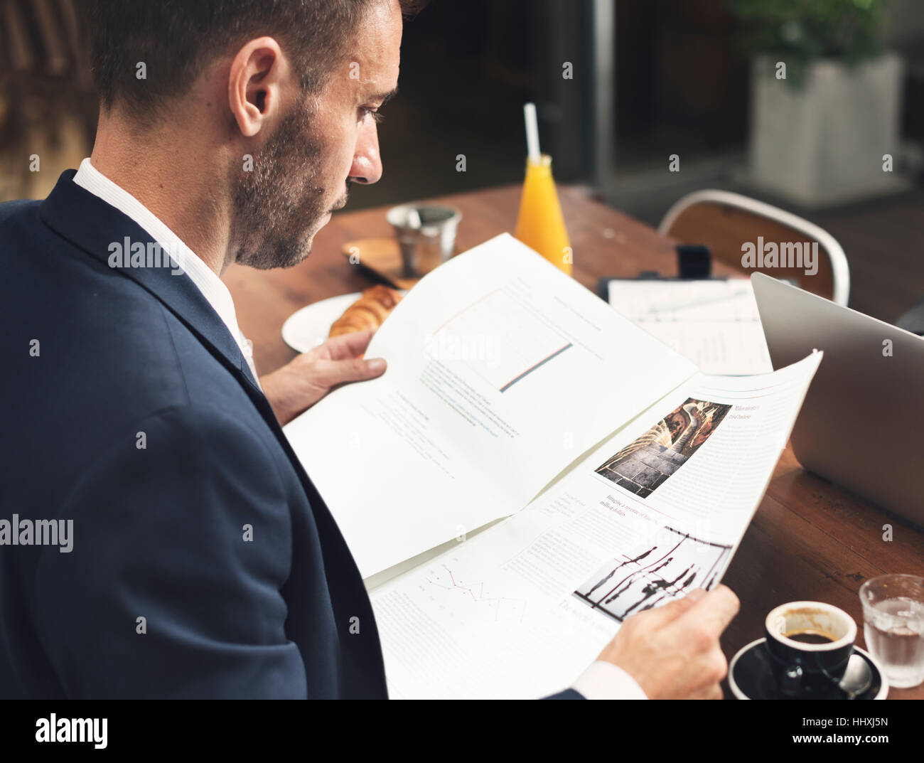 Business Man Reading Newspaper Concept Stock Photo - Alamy