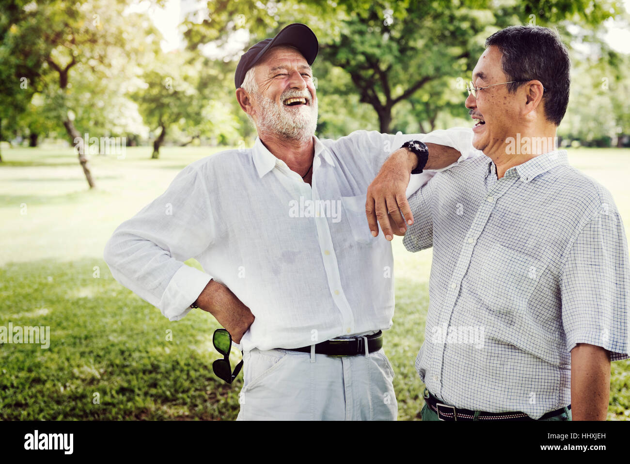 Senior Friends Retirement Talking Laughing Concept Stock Photo - Alamy