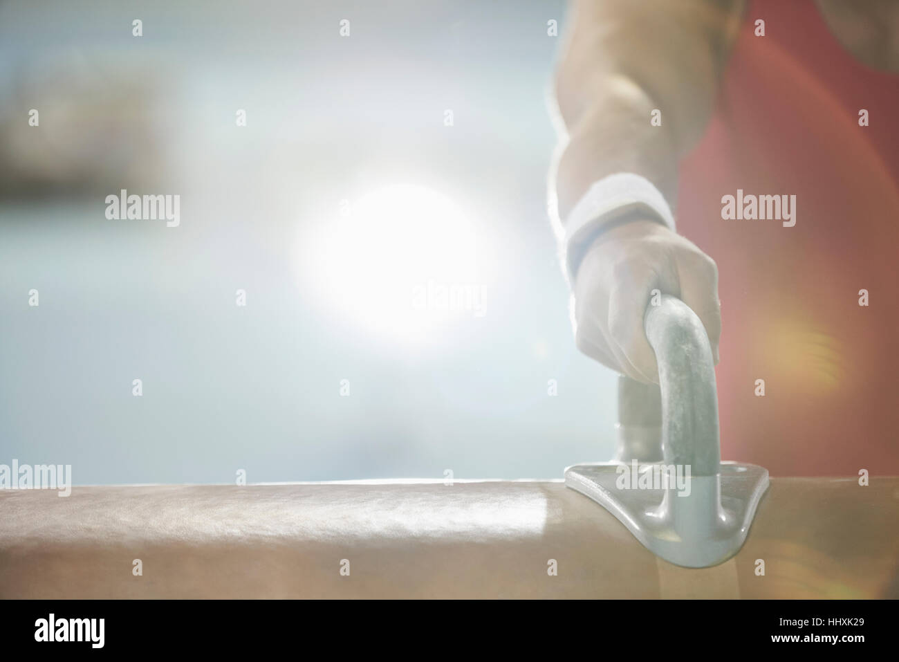 Close up hand of male gymnast on pommel horse Stock Photo - Alamy