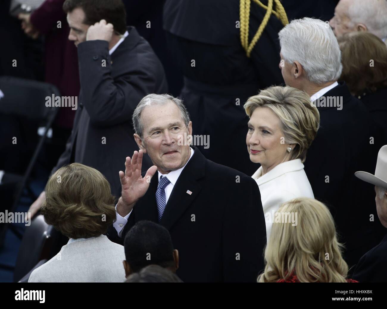 Former President George W. Bush, left, his wife Laura, Former Secretary ...