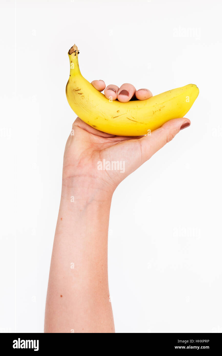 Human Hand Holding Banana Fruit Nutrition Concept Stock Photo - Alamy
