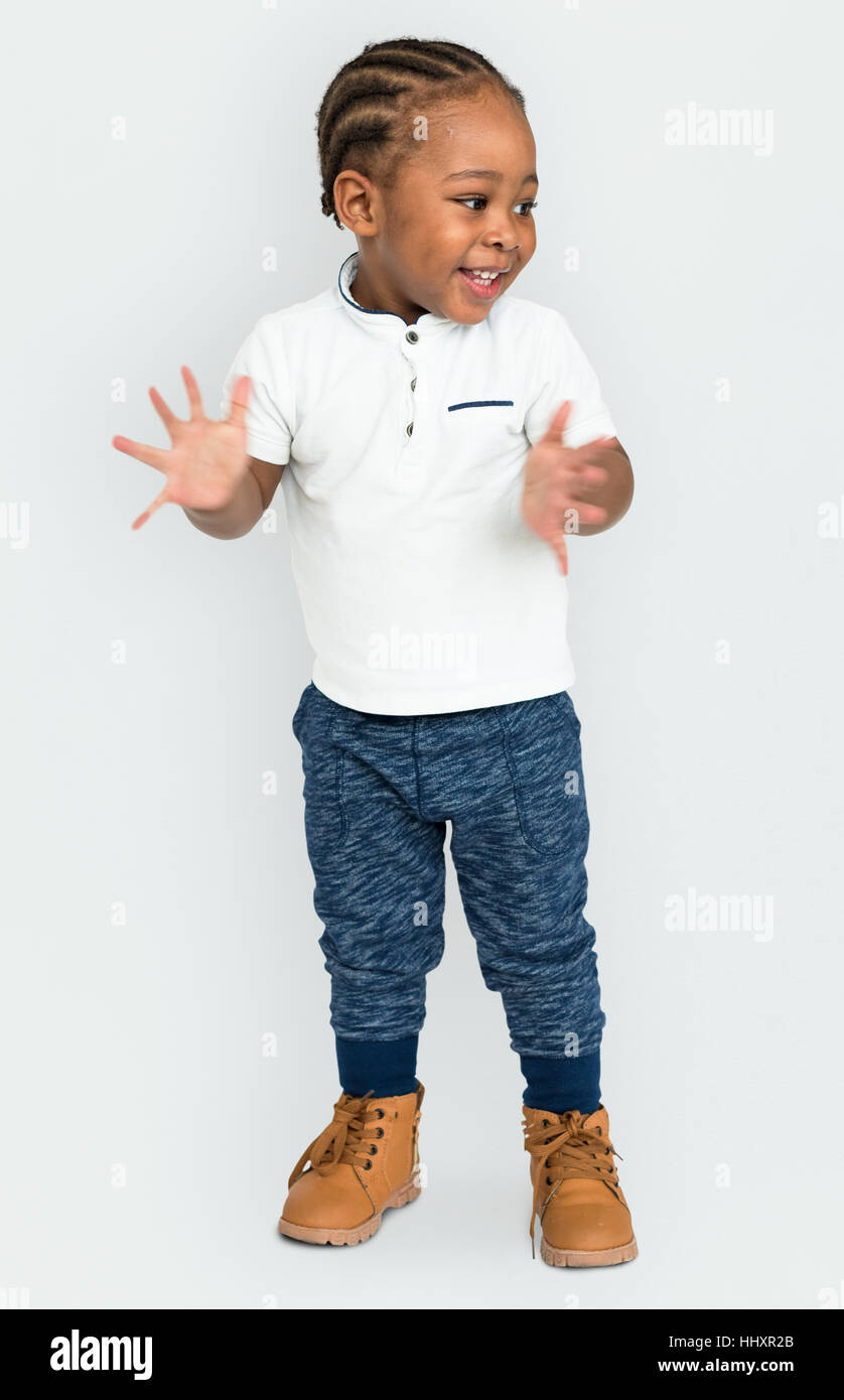 Kid Pose Standing Studio Concept Stock Photo - Alamy