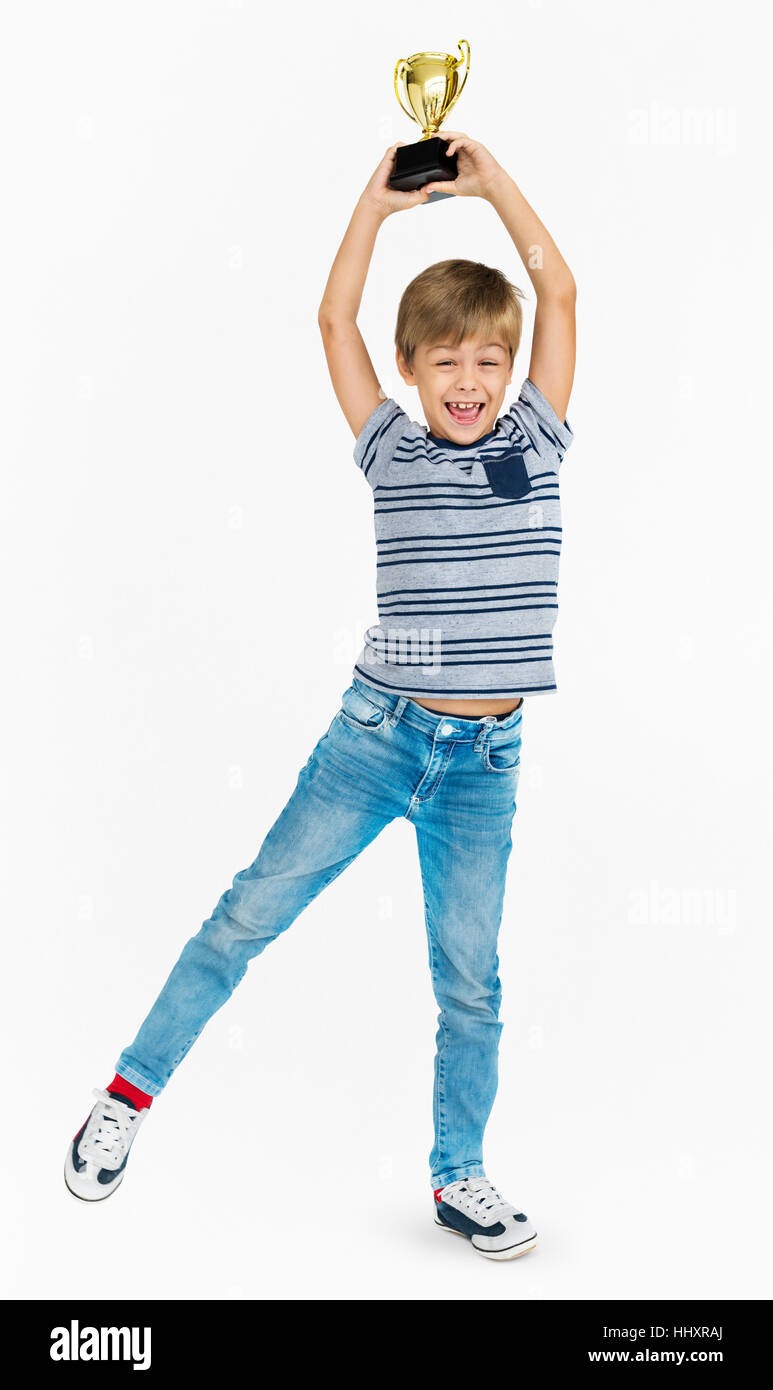 Boy Won Award Reward Cup Prize Concept Stock Photo - Alamy