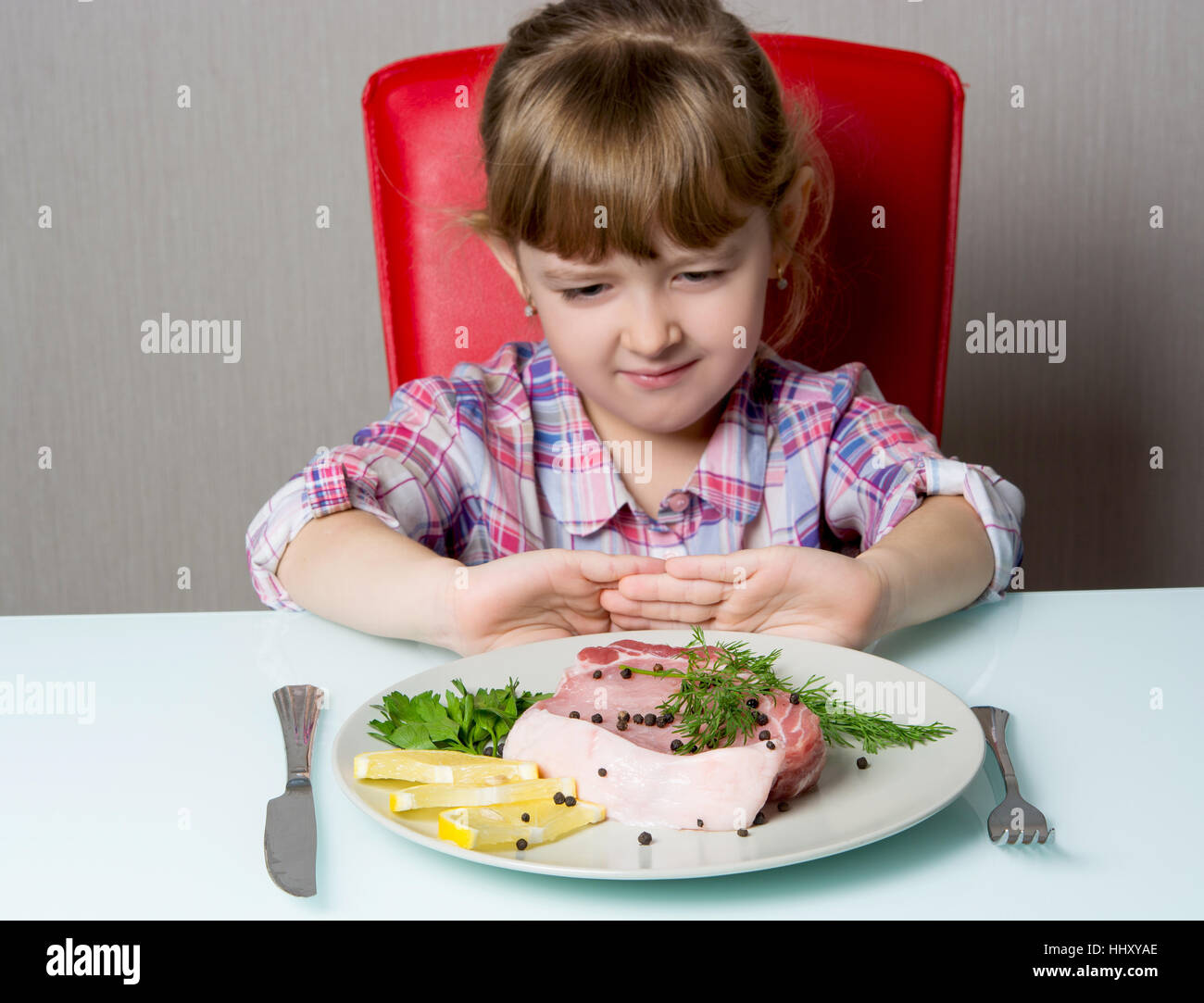 Child refuses to eat meat hi-res stock photography and images - Alamy