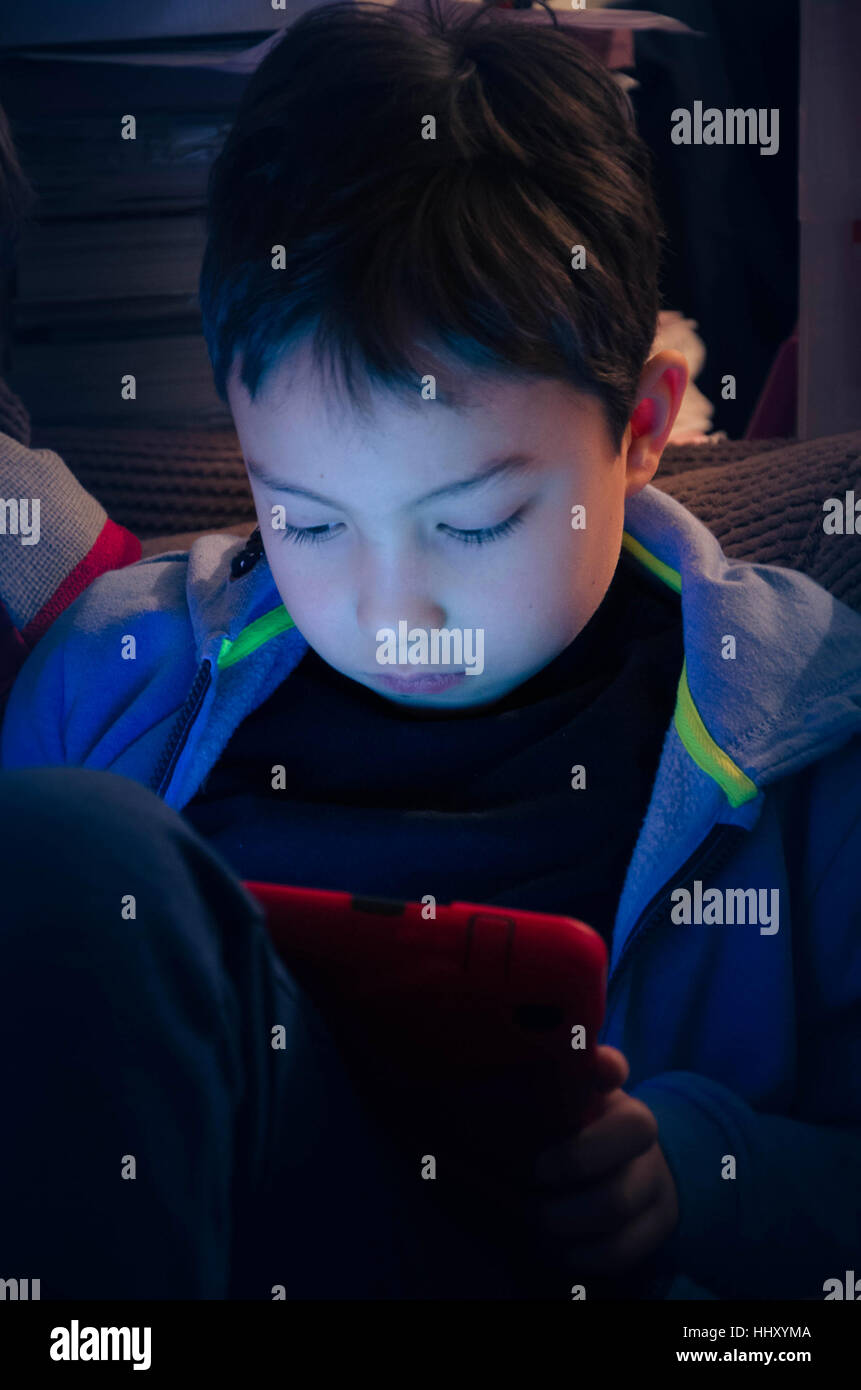 Boy gaming evening hi-res stock photography and images - Alamy