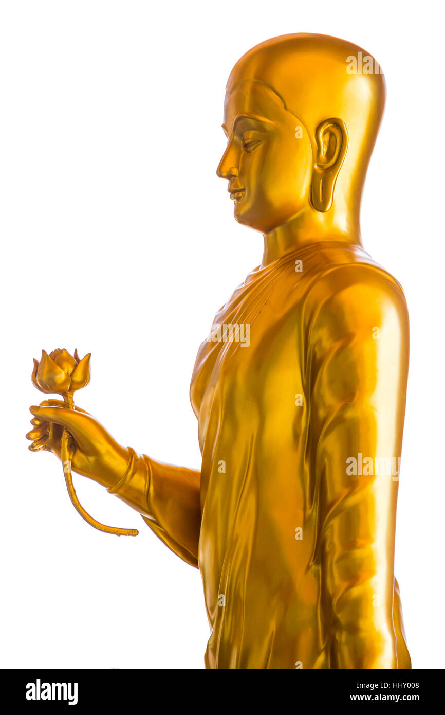 Golden Buddha handing lotus statue viewed from the side isolated Stock ...
