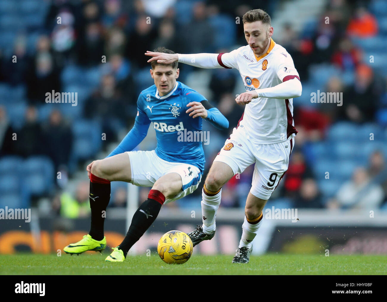 Rangers' Rob Kiernan (left) and Motherwell's Louis Moult battle for the ...