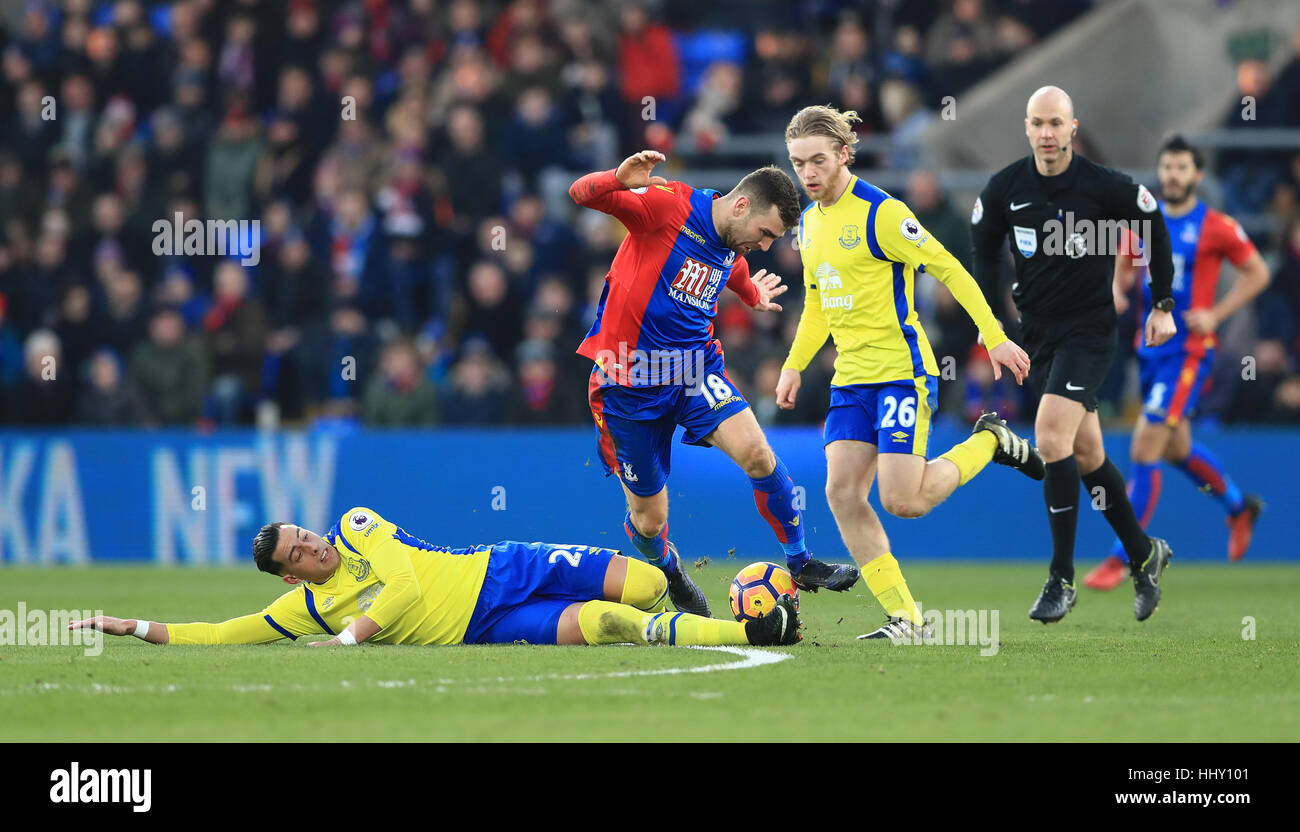 Everton's Ramiro Funes Mori (left) slides in to challenge Crystal ...