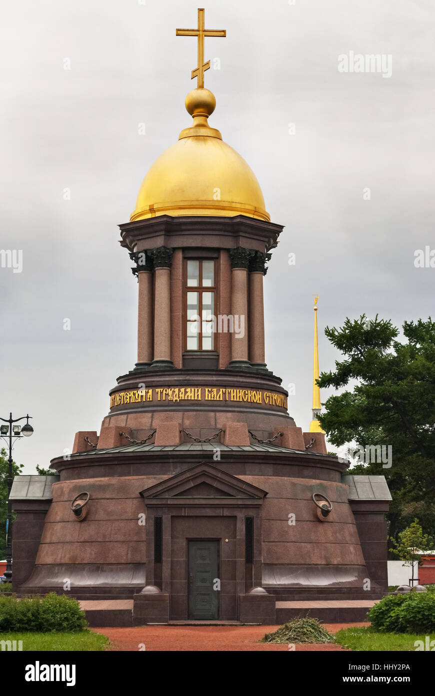 The chapel of pink marble and granite with a gilded dome and cross on ...