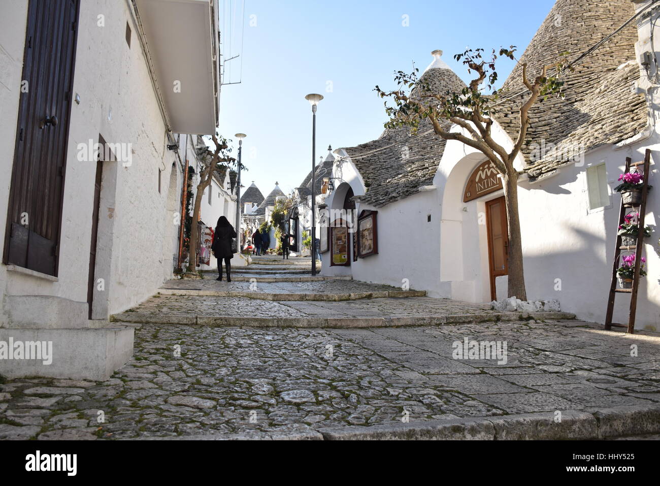 The beautiful town of Alberobello and its the traditional trulli houses ...