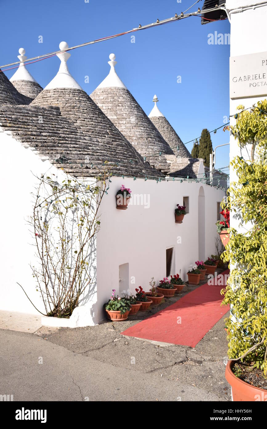 The beautiful town of Alberobello and its the traditional trulli houses ...