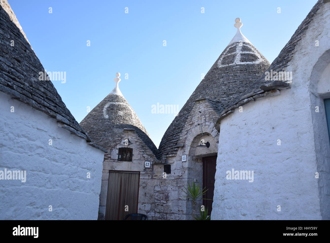 The beautiful town of Alberobello and its the traditional trulli houses ...