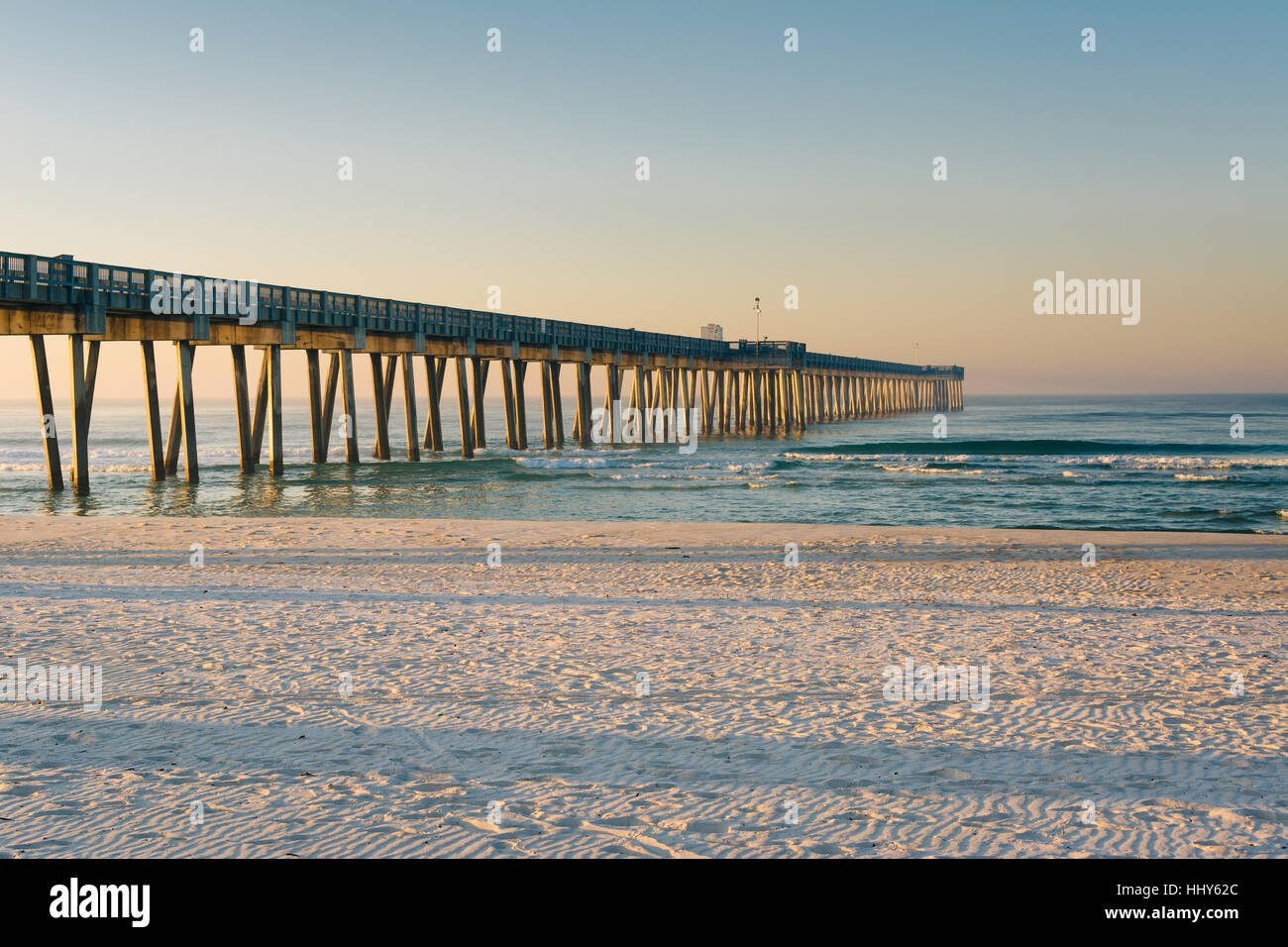 Morning light on the M.B. Miller County Pier and sandy beach along the ...