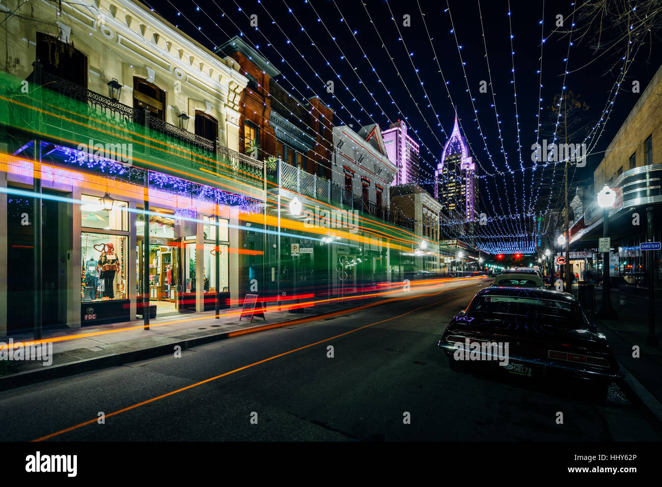 String lights hung over Dauphin Street, and buildings in downtown ...