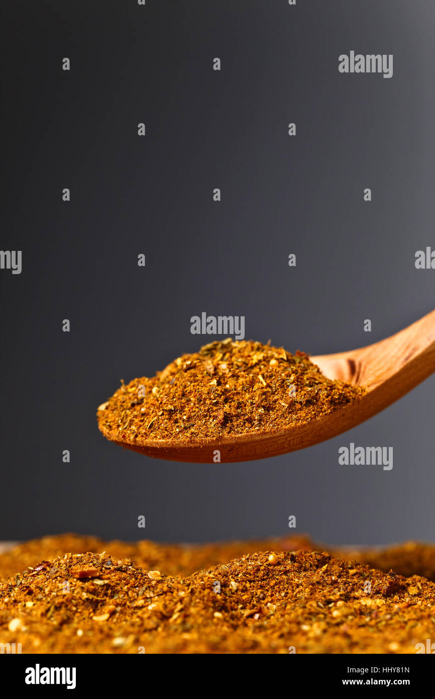 Wooden spoons with mixture of different East spices Stock Photo - Alamy