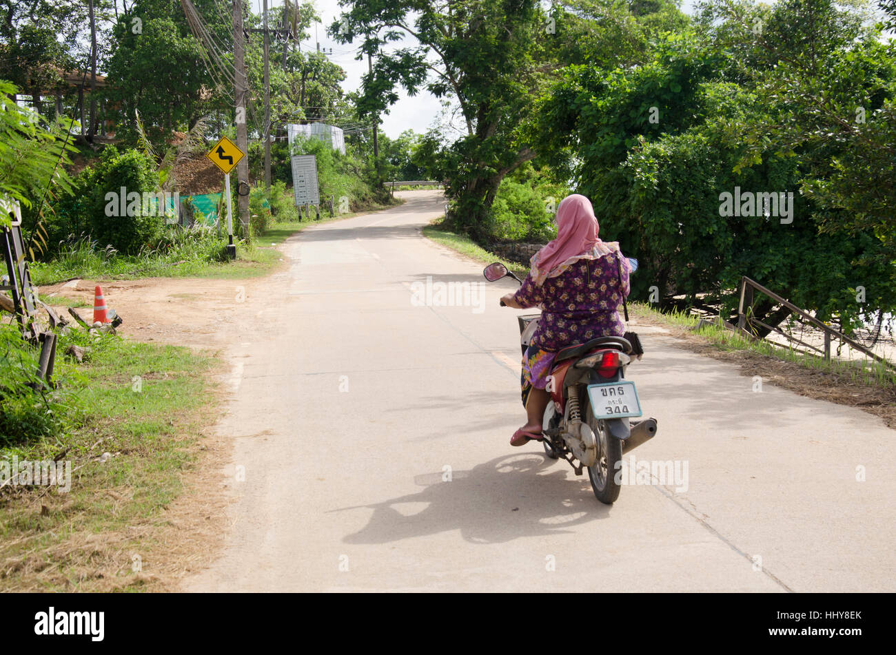 Motorcycle woman muslim transport hi-res stock photography and images ...