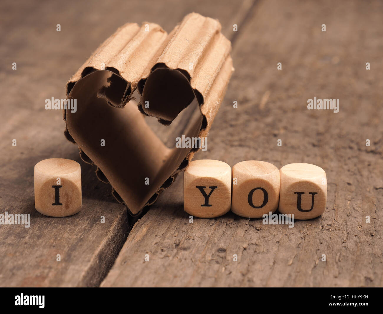 Love concept image with a cardboard heart shape using as background or ...