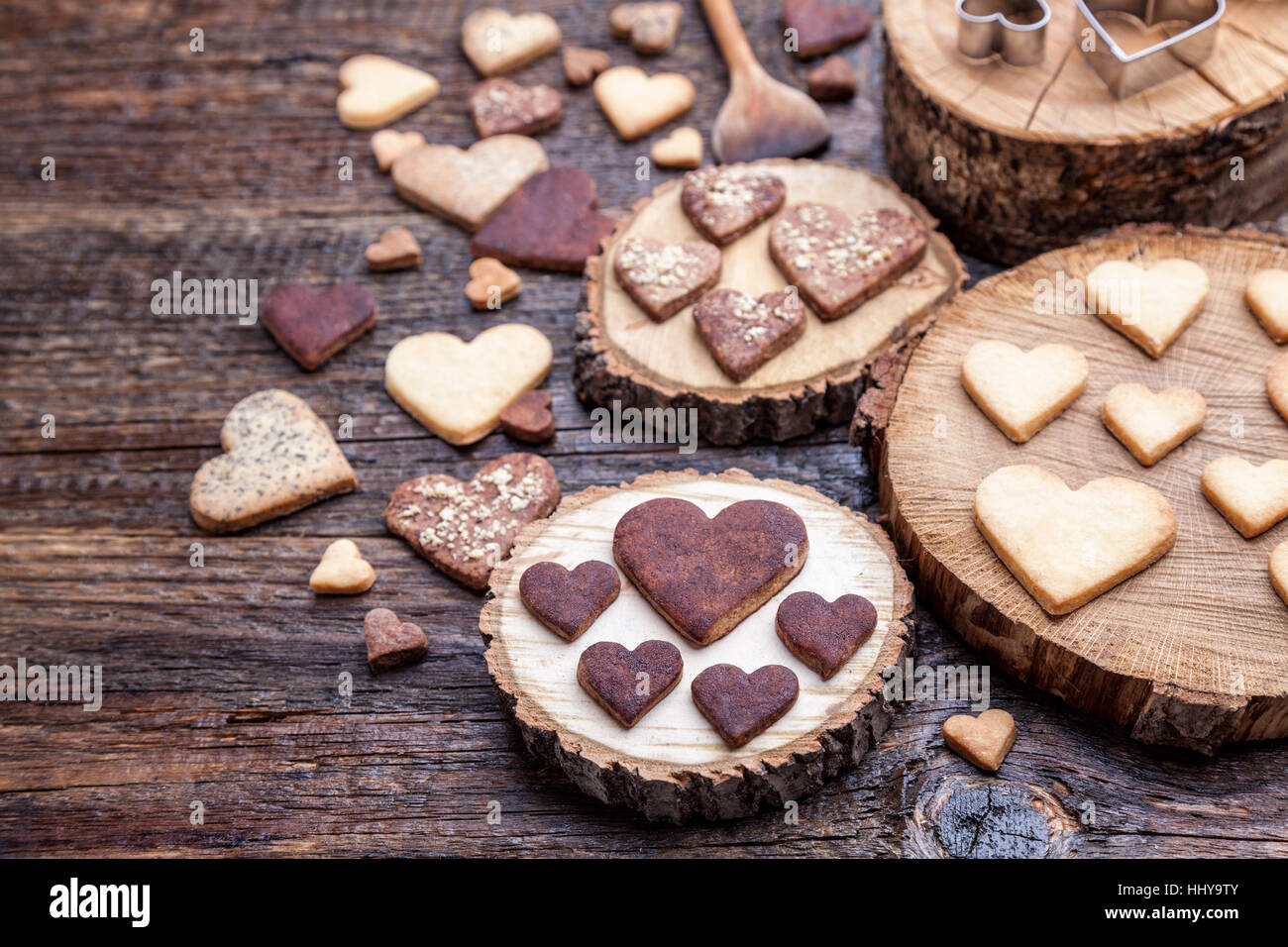 Delicious heart shaped cookies baked with love on wooden background ...