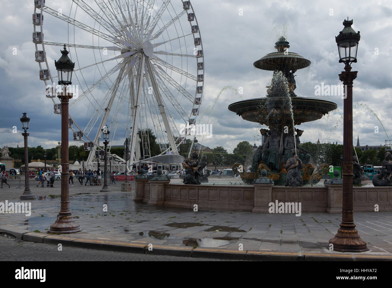 Fountain of the Rivers and the Ferris wheel known as the Roue de Paris ...