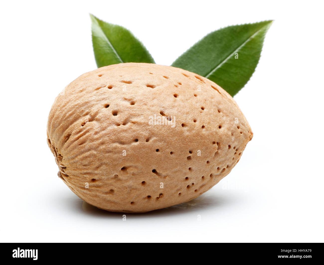 Almonds nut isolated on a white background Stock Photo - Alamy