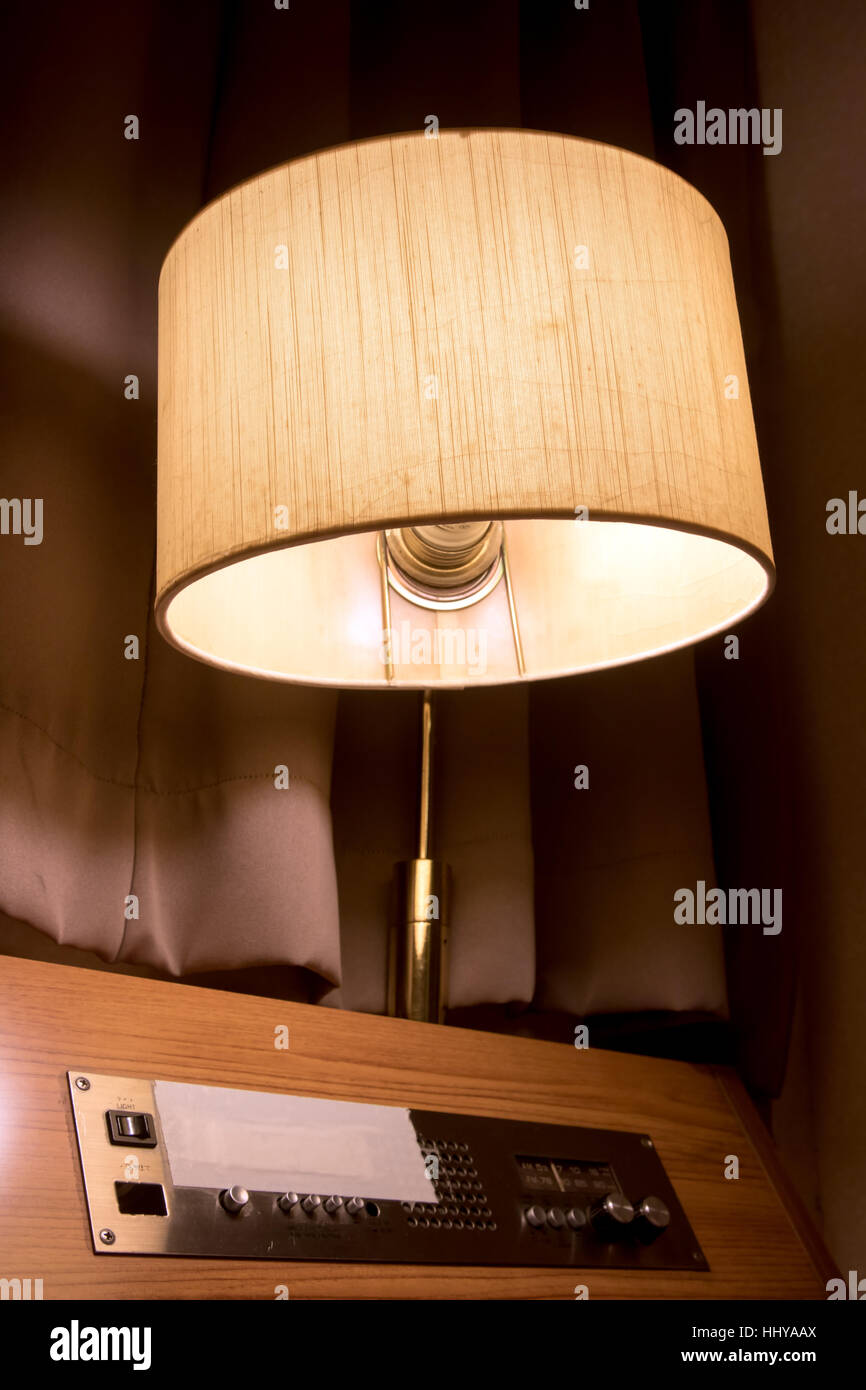 old lamp shining on retro radio Stock Photo - Alamy