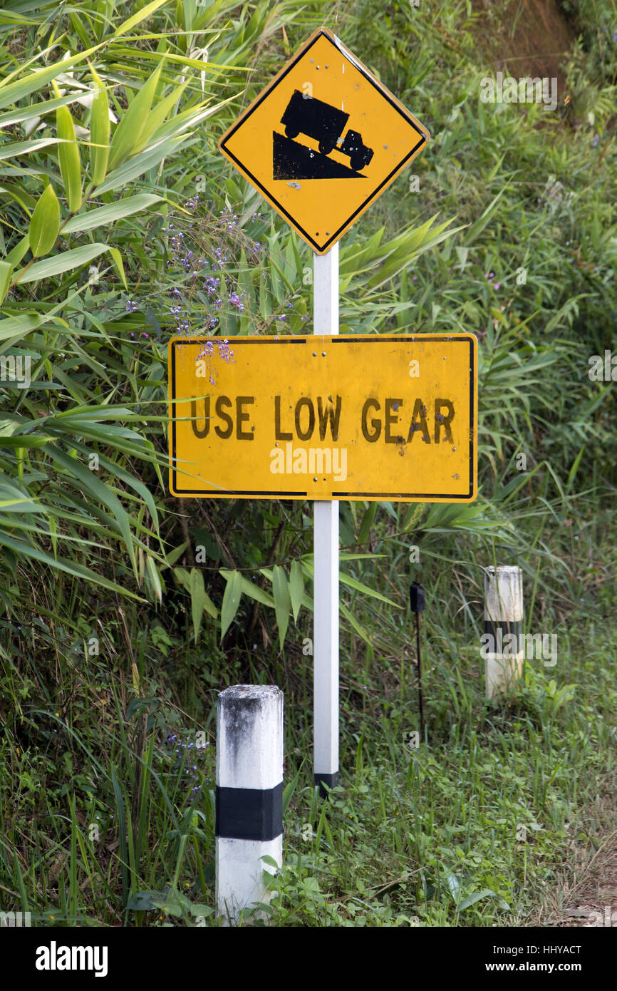 Warning traffic sign USE LOW GEAR on the road in the countryside Stock ...
