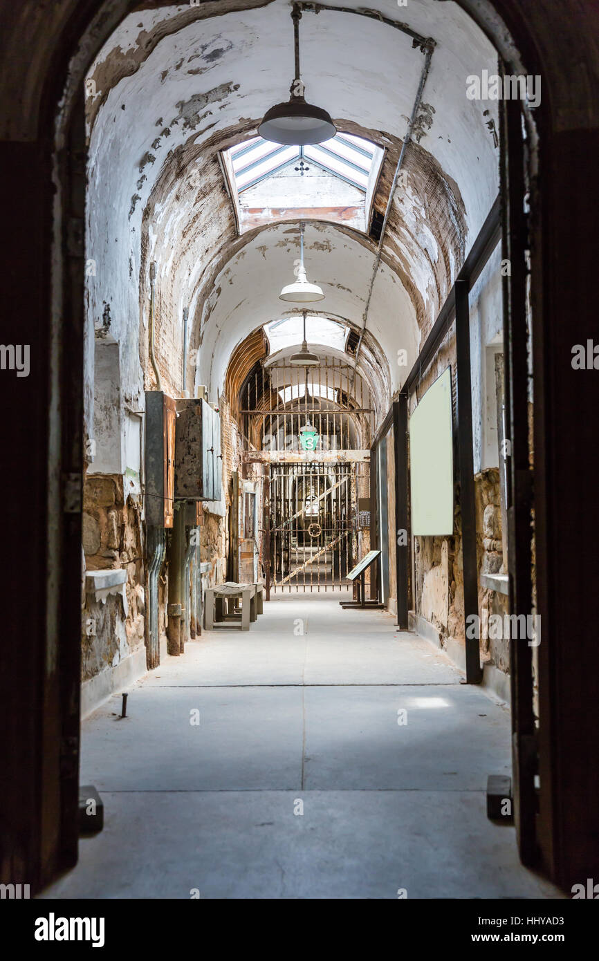 Jail hallway with locked doors Stock Photo - Alamy