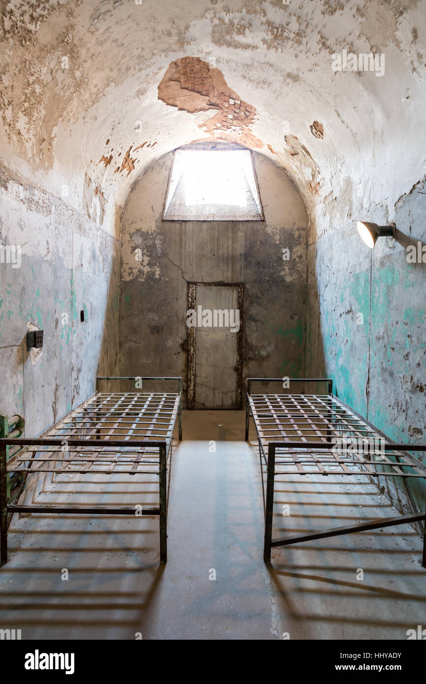 Grunge prison cell with sunlight window Stock Photo - Alamy