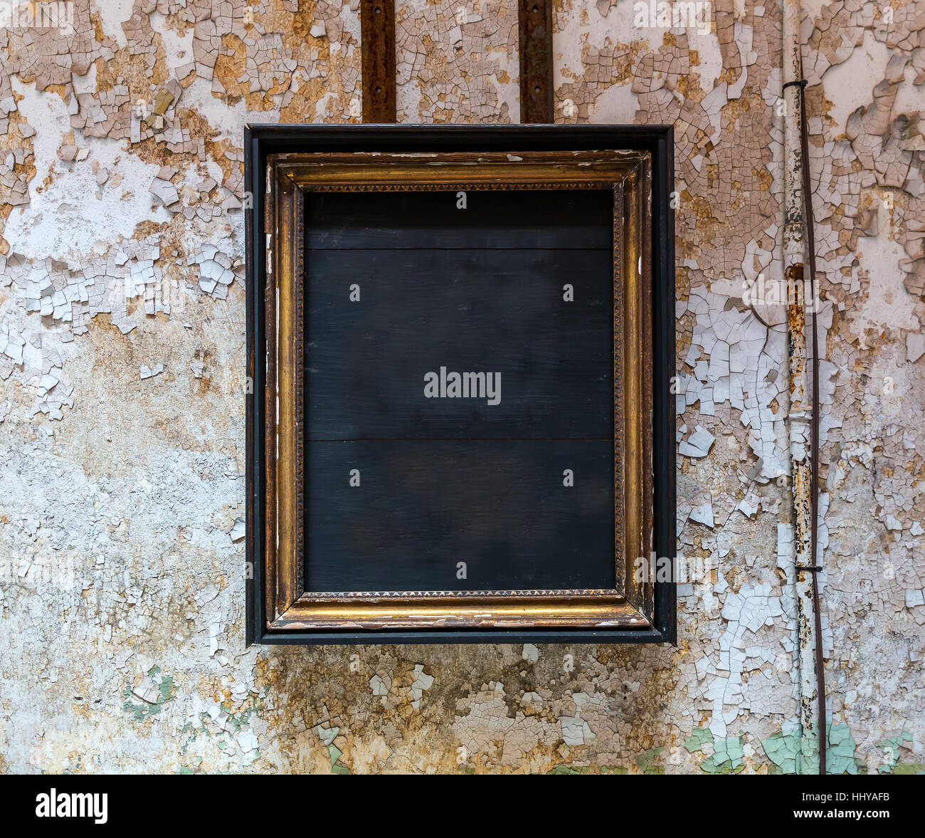 Empty frame from an icon in prison cell Stock Photo - Alamy