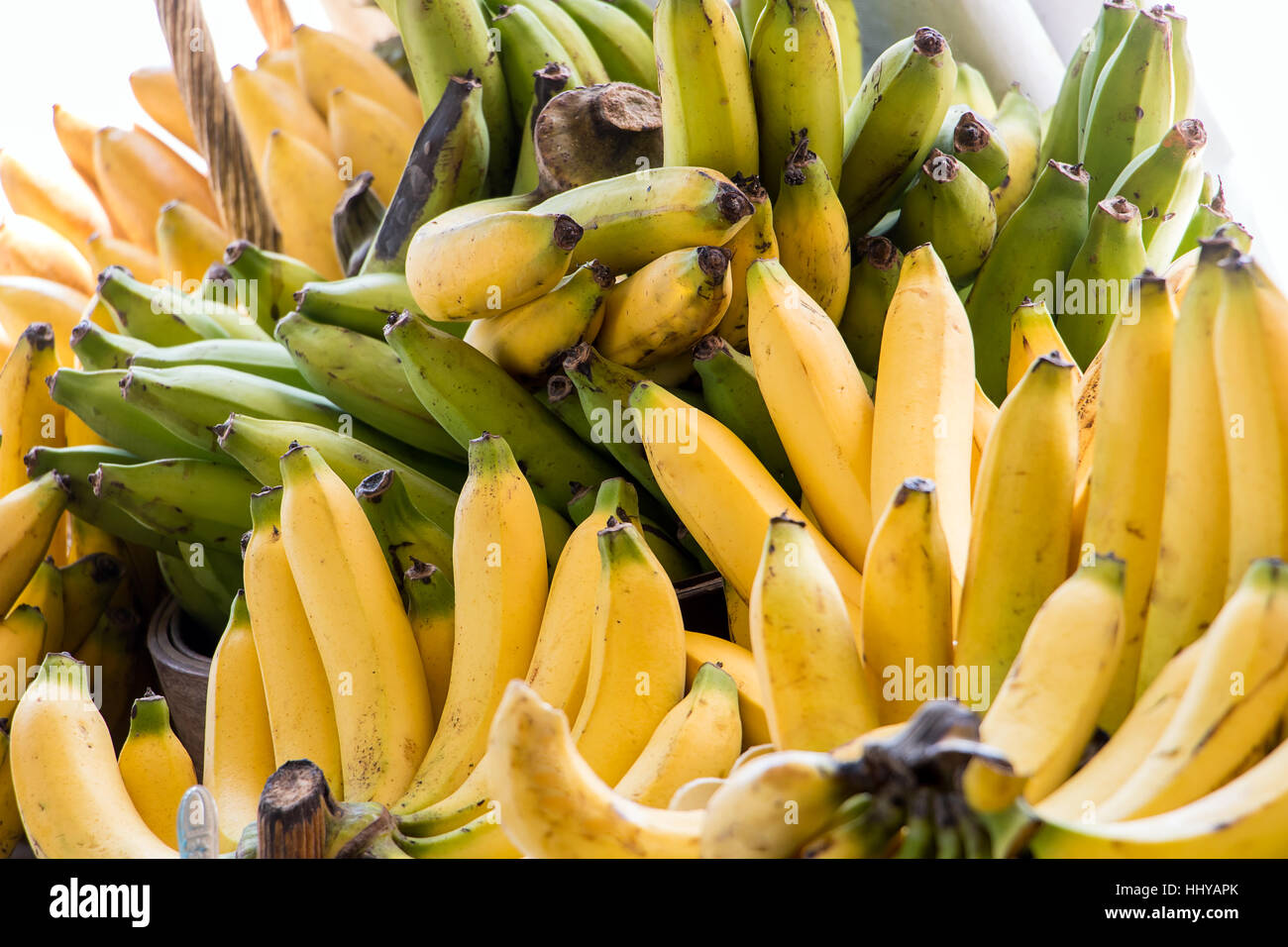 bundle of bananas at street shop in Thailand Stock Photo - Alamy