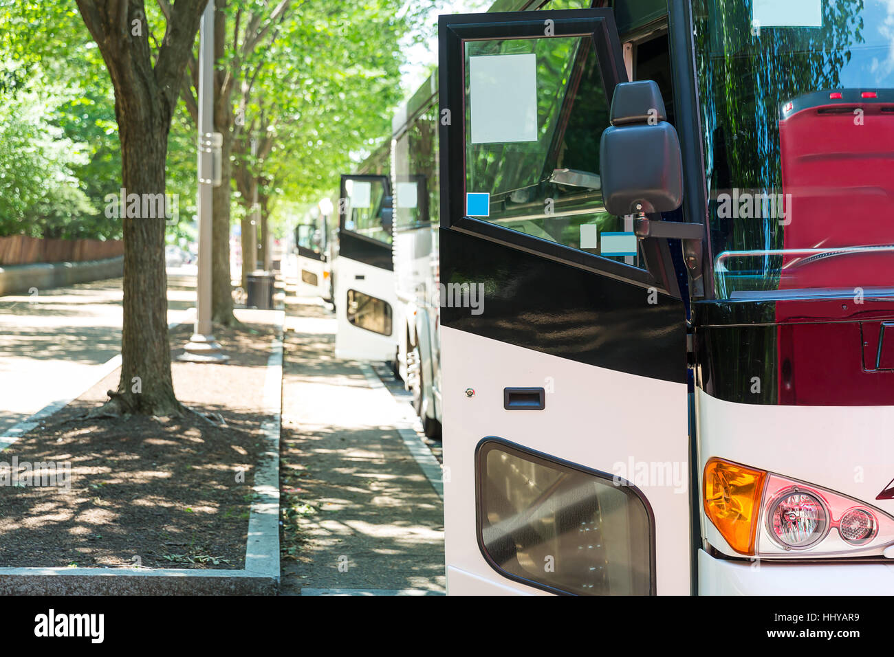 Tourist bus row Stock Photo - Alamy